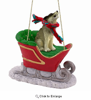 Timber Wolf Sleigh Ride Christmas Ornament | Animalden.com