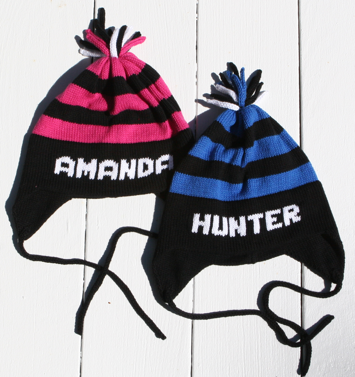 midnight black stripe ear flap hat featured at babybox.com