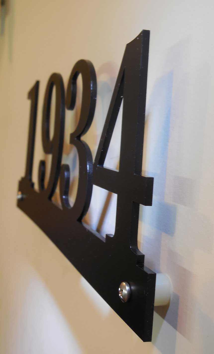 Spelled Out House Number or Street Name Sign in Block Letters