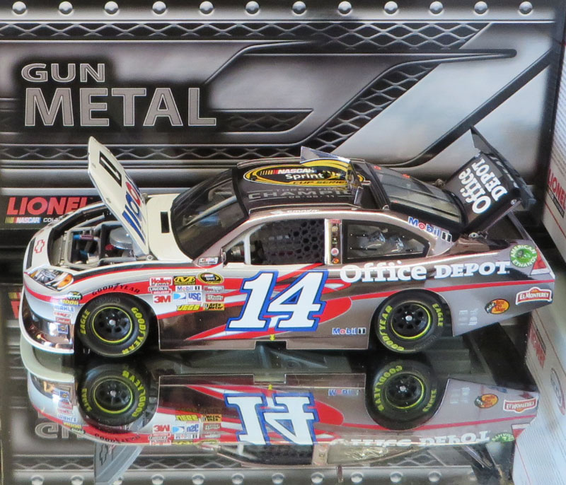 TONY STEWART 2011 MOBIL ONE CHAMPIONSHIP GUN METAL 1/24 ACTION