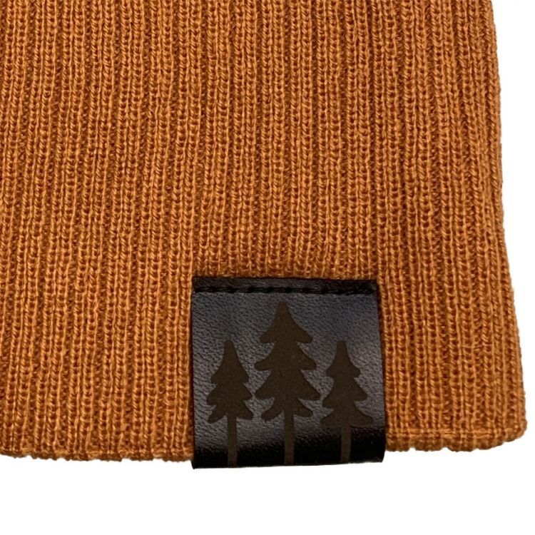 Pacififc Clip Cap Labeling | Custom Leather & Woven Clip Labels