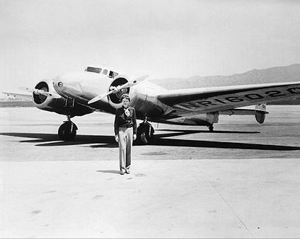 Amelia Earhart with her Lockheed Electra Photo Print for Sale
