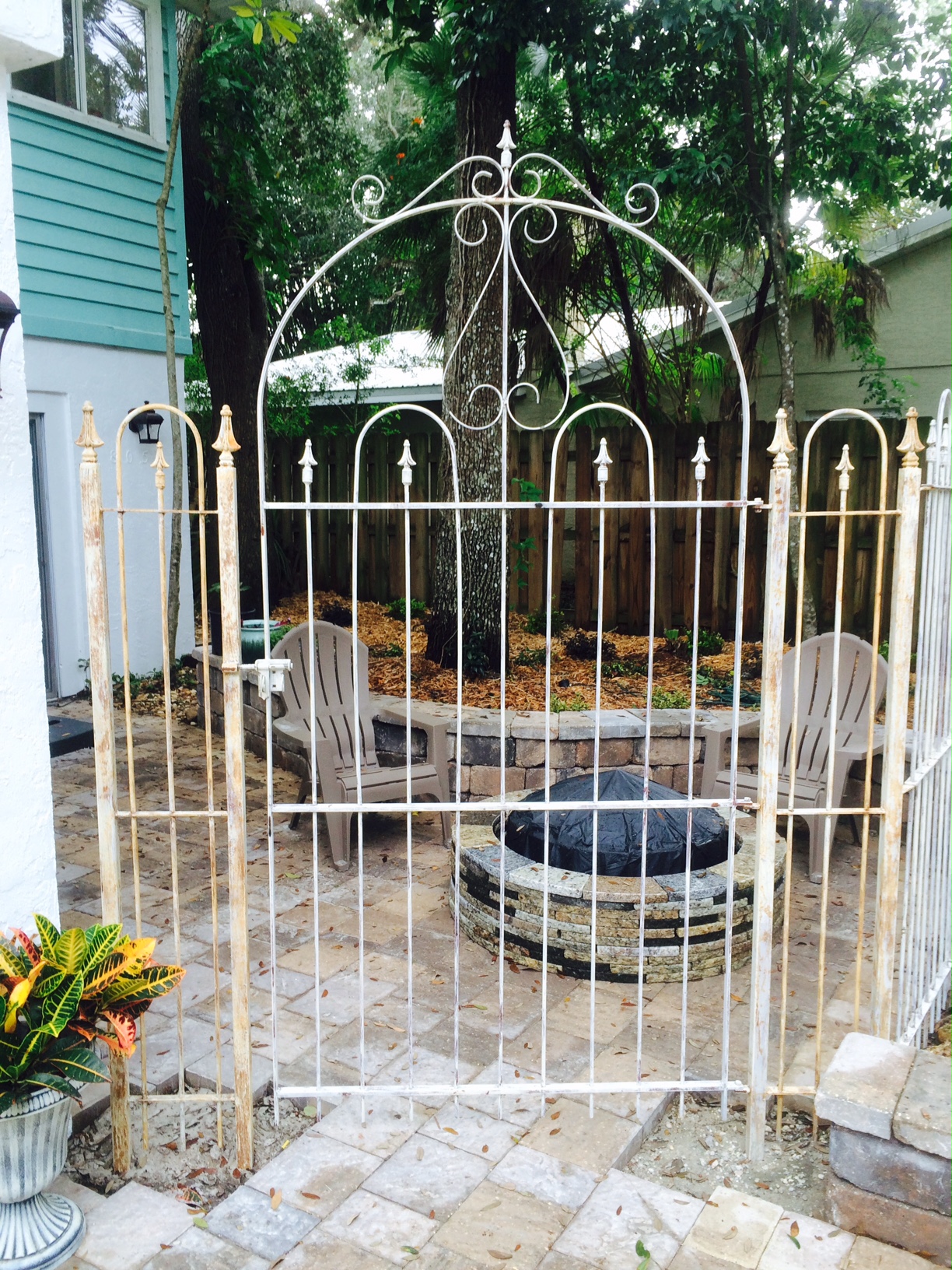 6 Foot Wrought Iron Fence Installed on a Grade