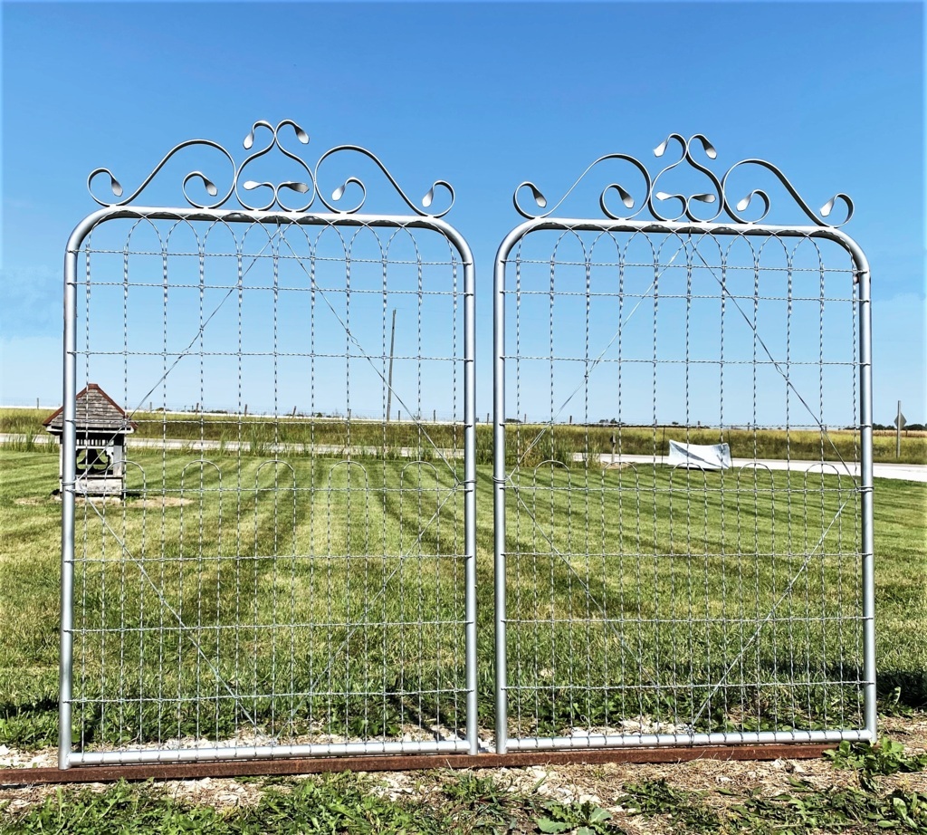 2 - 4'tall x 3'wide Gates Hung To Make a 6'wide Center Divide Opening