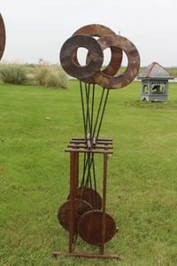Rustic Metal 54" Small Pendulum Ornamental Yard Sculpture