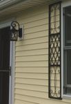 Wrought Iron Skyview Exterior Window Shutters