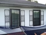 Wrought Iron Skyview Exterior Window Shutters
