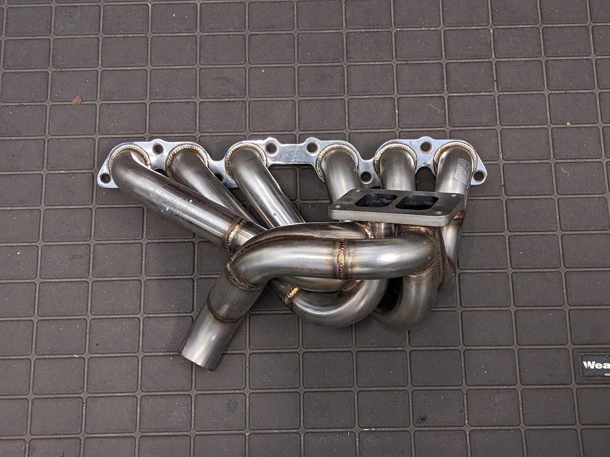 Turbo Manifolds & Down Pipes - 2JZGE T6 Divided Mid Frame Turbo Manifold