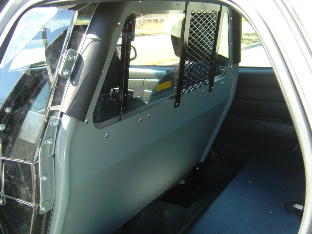 2003 Silver Ford Police Interceptor Pro Gard Cage from SWPS.com