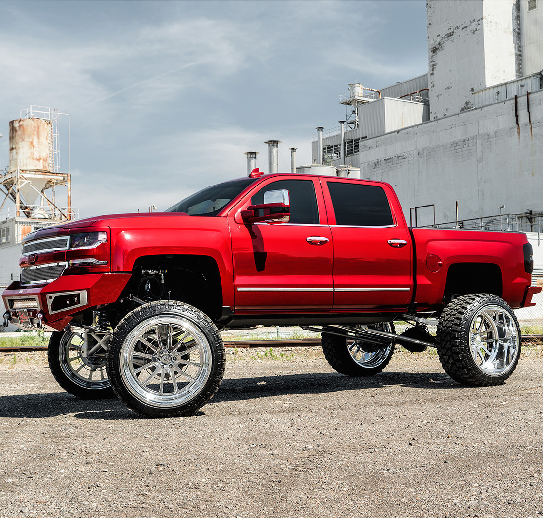 Jacked Up Red Chevy Trucks