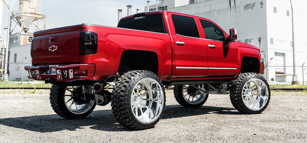 Jacked Up Red Chevy Trucks