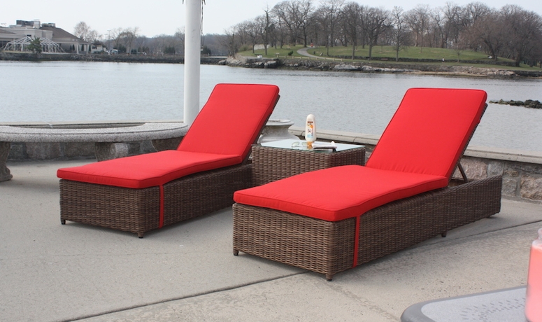 Why We Love Wicker Chaise Lounges by the Pool