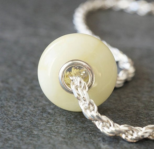 Beautifully Made Amber Charm Bead [Amber Artisans Boutique].