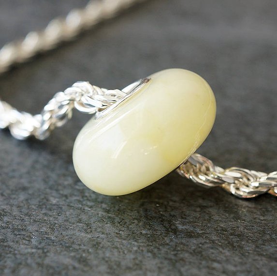 Beautifully Made Amber Charm Bead [Amber Artisans Boutique].