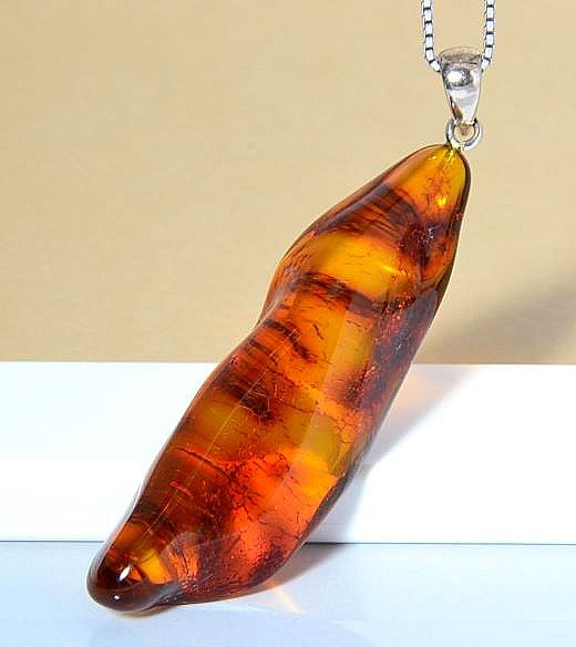 Baltic Amber Amulets Made of Natural Shape Amber Rock.