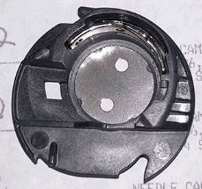 Singer bobbin case #68009436 for model S900