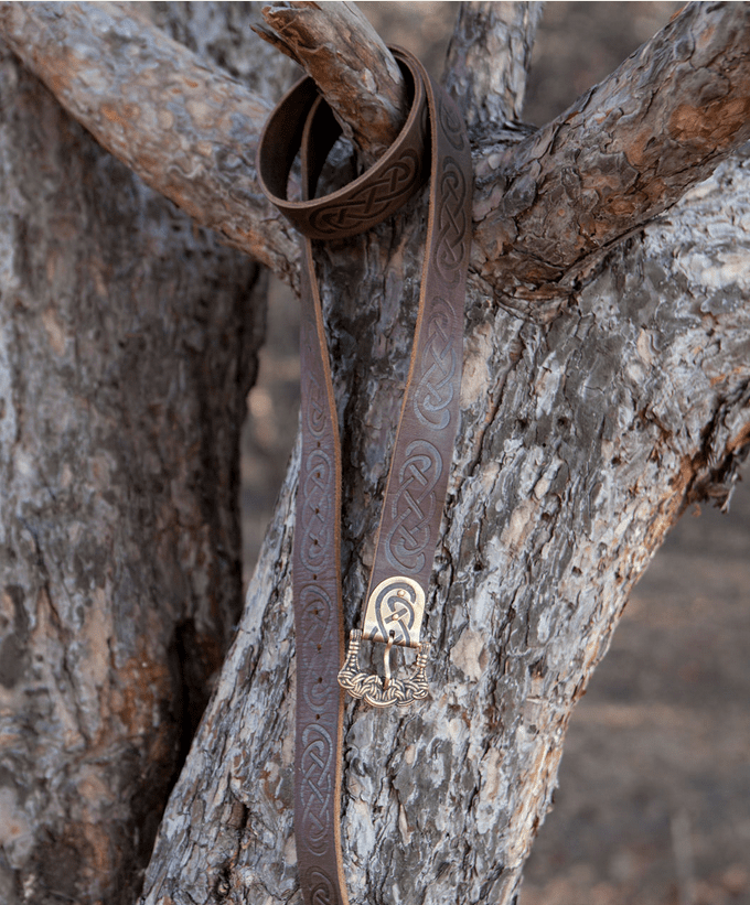 Embossed Viking Belt leather belt with molded brass clasp.